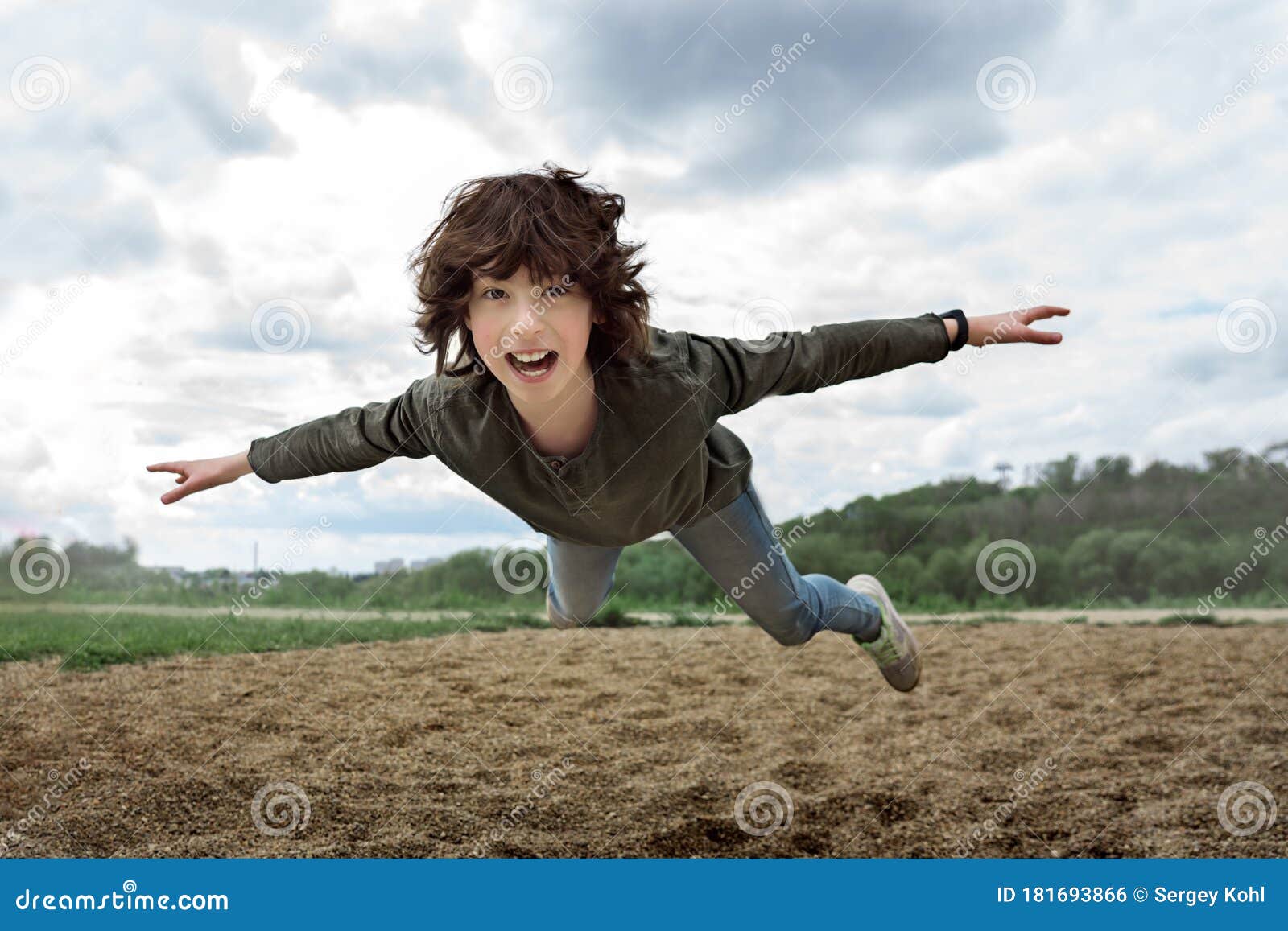 Joyful boy in flight stock photo. Image of freedom, childhood - 181693866
