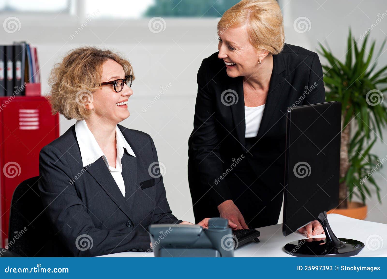 Joyful Businesswomen Enjoying at Work Desk Stock Image - Image of ...
