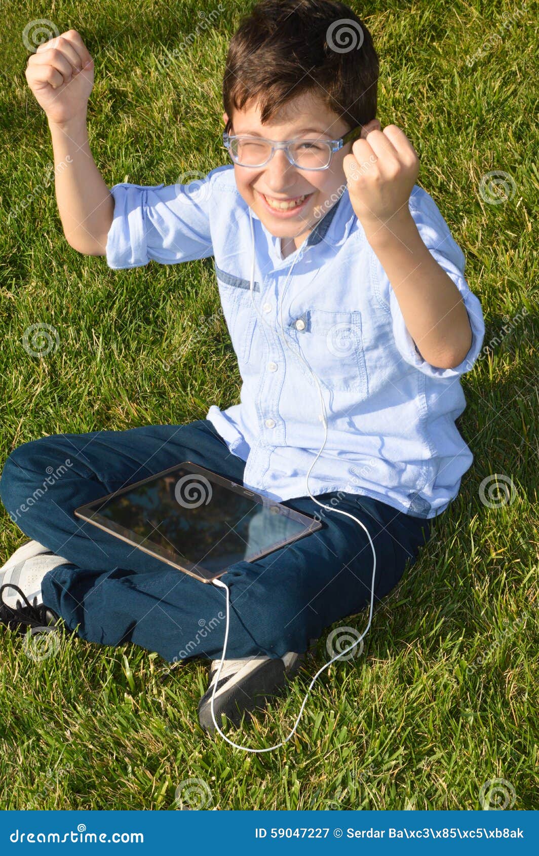 Joyful child and tablet stock image. Image of headphone - 59047227