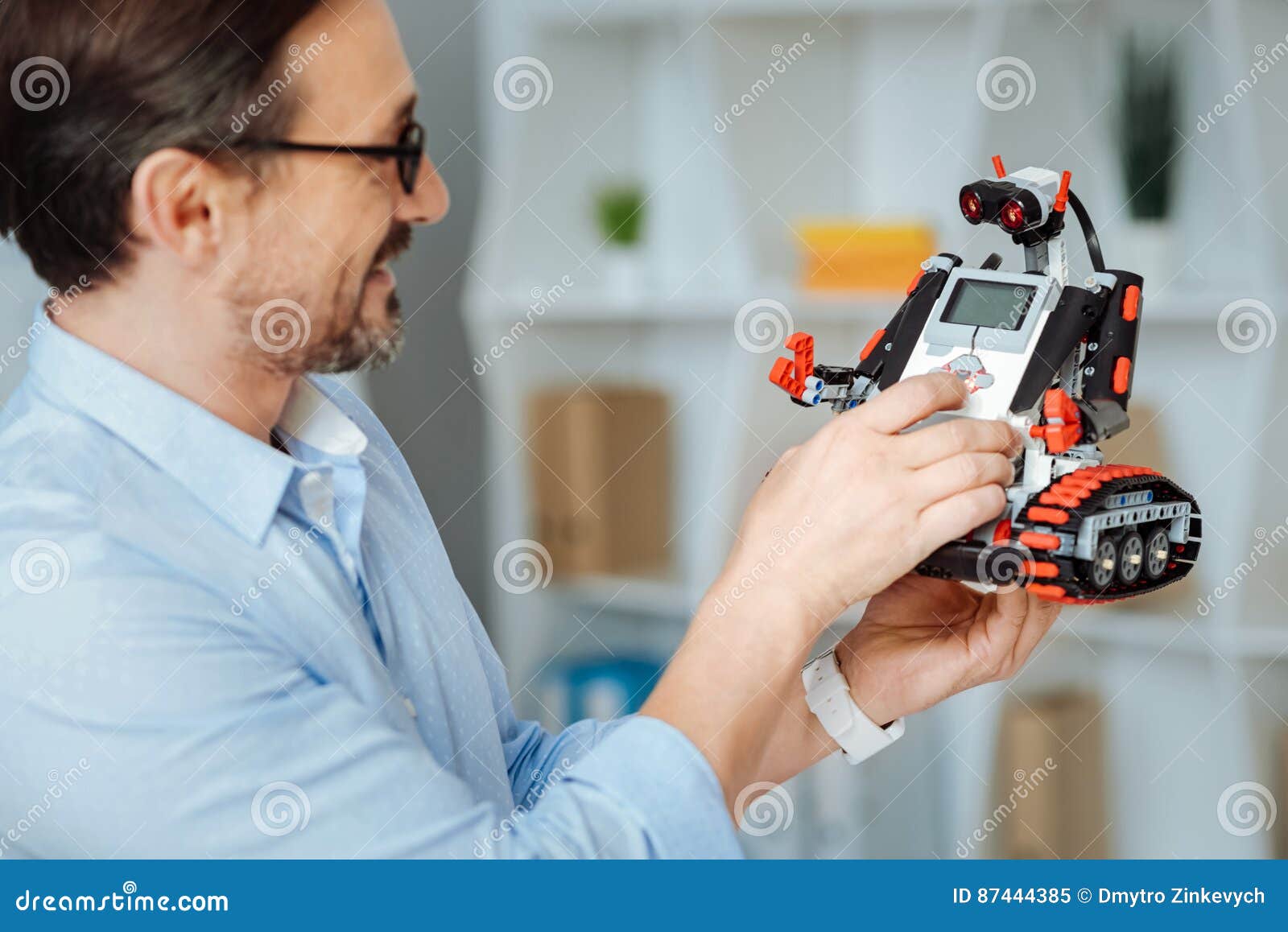 Joyful Engineer Testing Robot Stock Image - Image of construction ...