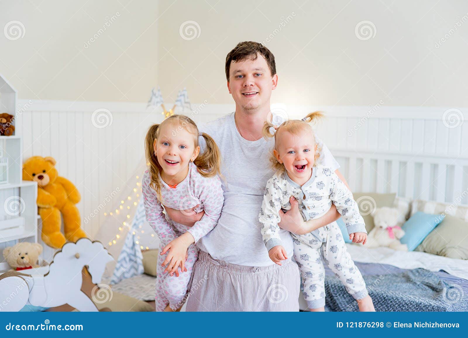 Joyful family at home stock photo. Image of male, young - 121876298