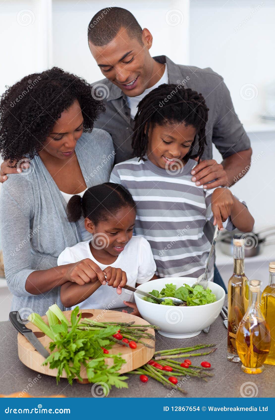 Joyful Family Preparing Dinner in the Kitchen Stock Photo - Image of ...