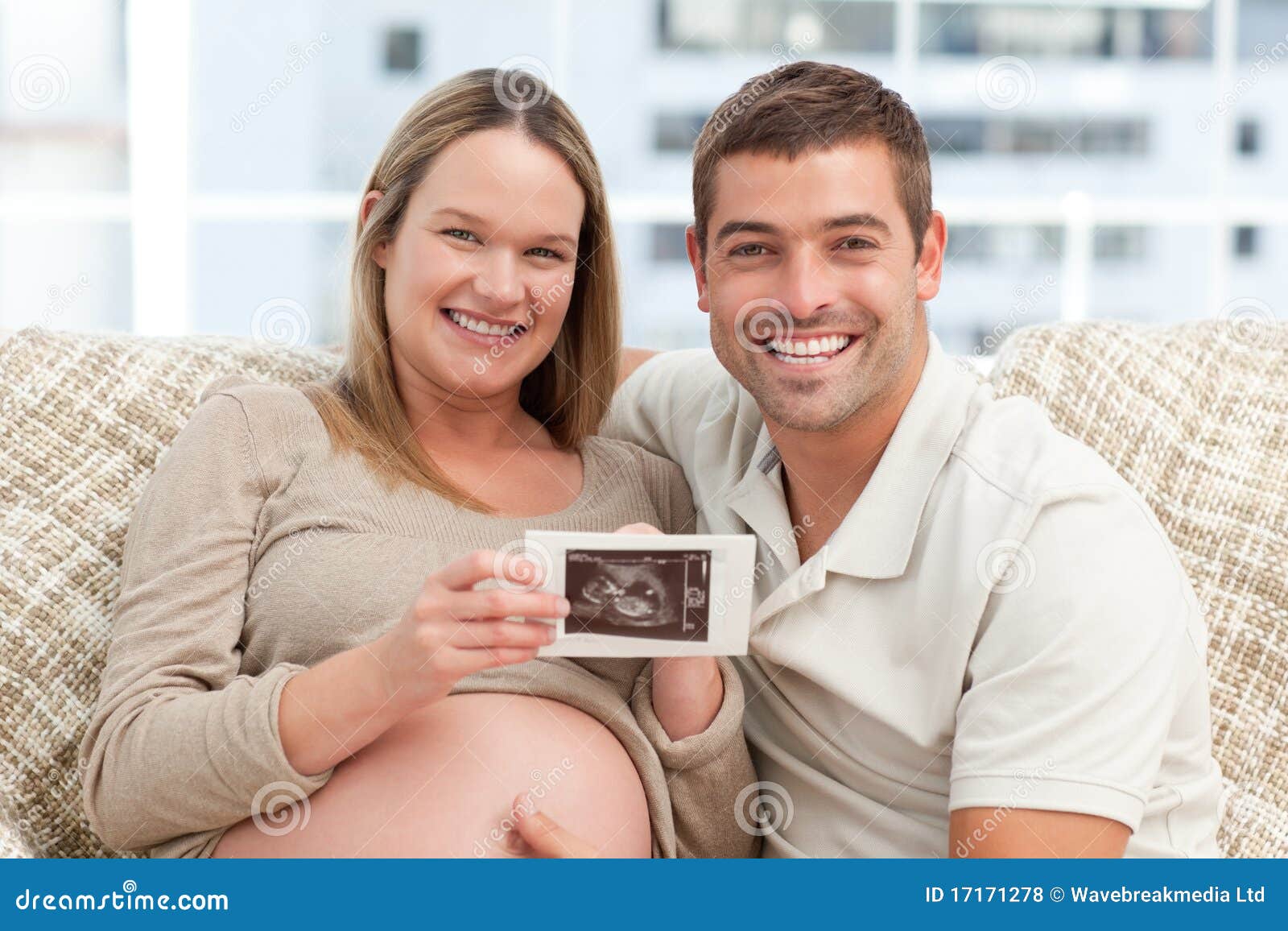 Joyful Future Parents Looking at an Echography Stock Photo - Image of ...