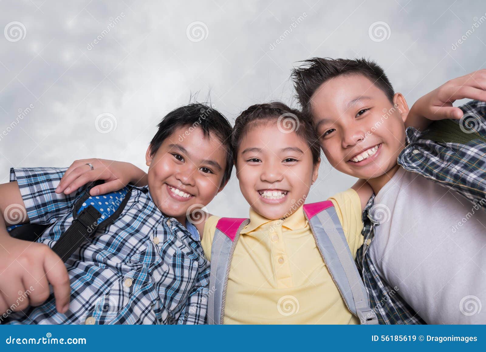 Joyful hugging kids stock image. Image of childhood, playful - 56185619