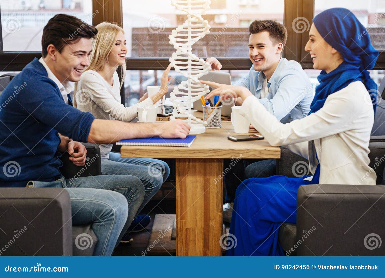 Joyful International Students Learning in the Cafe Together Stock Photo ...