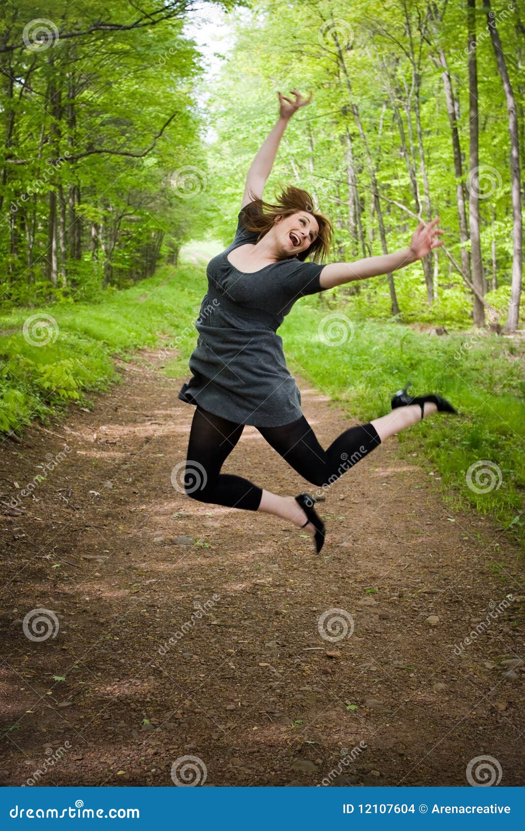 Joyful Jumping Woman stock photo. Image of beauty, dancing - 12107604