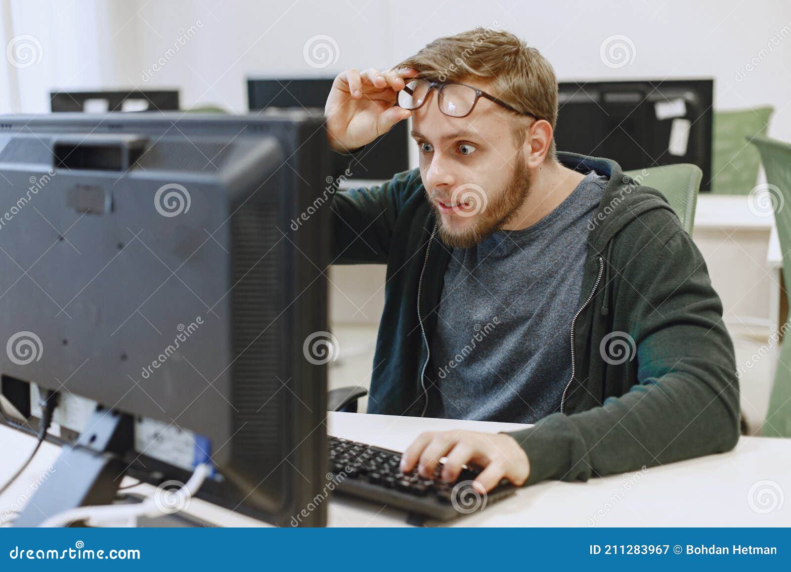 Joyful Man Sitting at the Computer. Stock Image - Image of employee ...