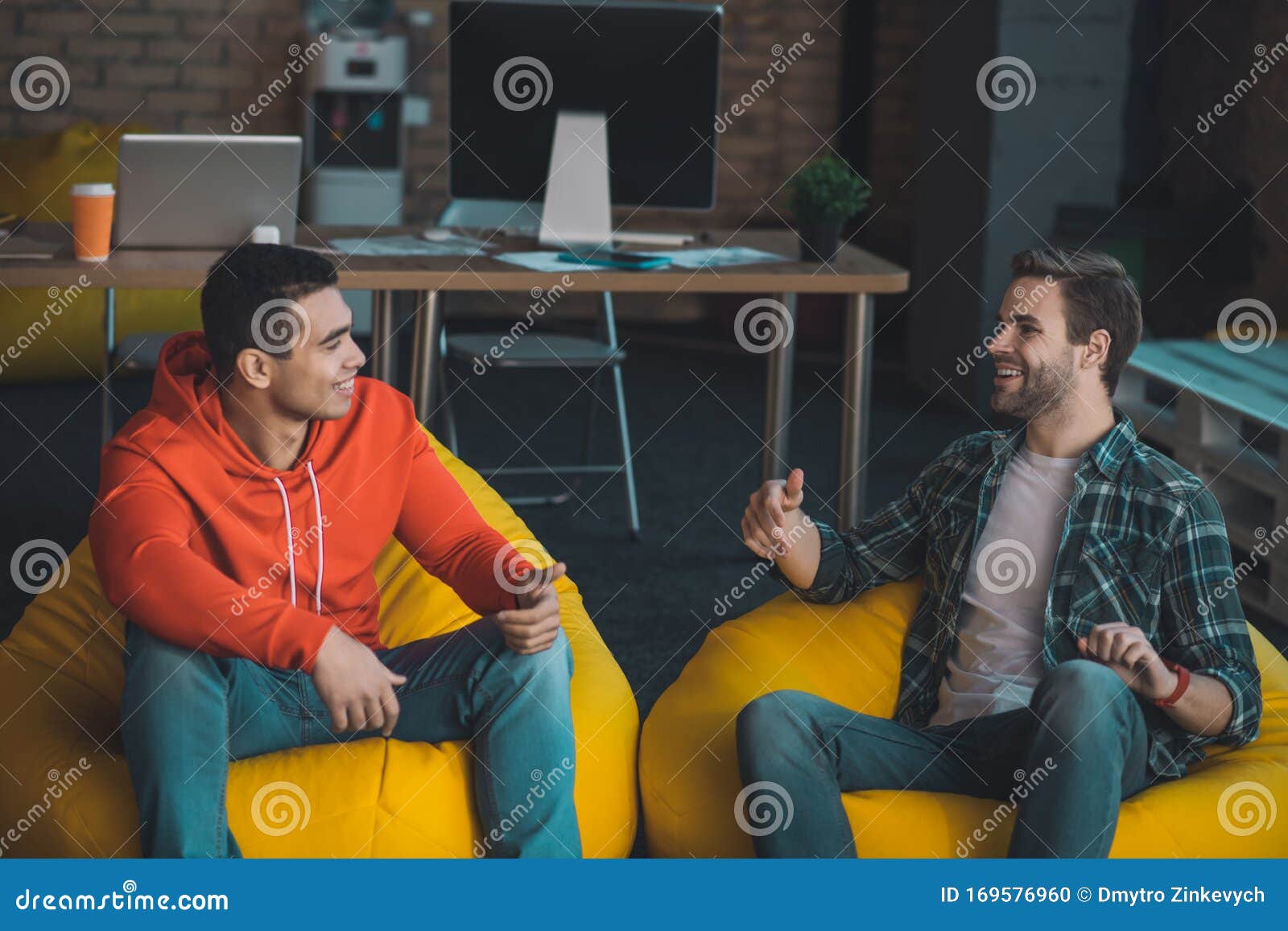 Joyful Nice Men Enjoying Their Pleasant Conversation Stock Photo ...