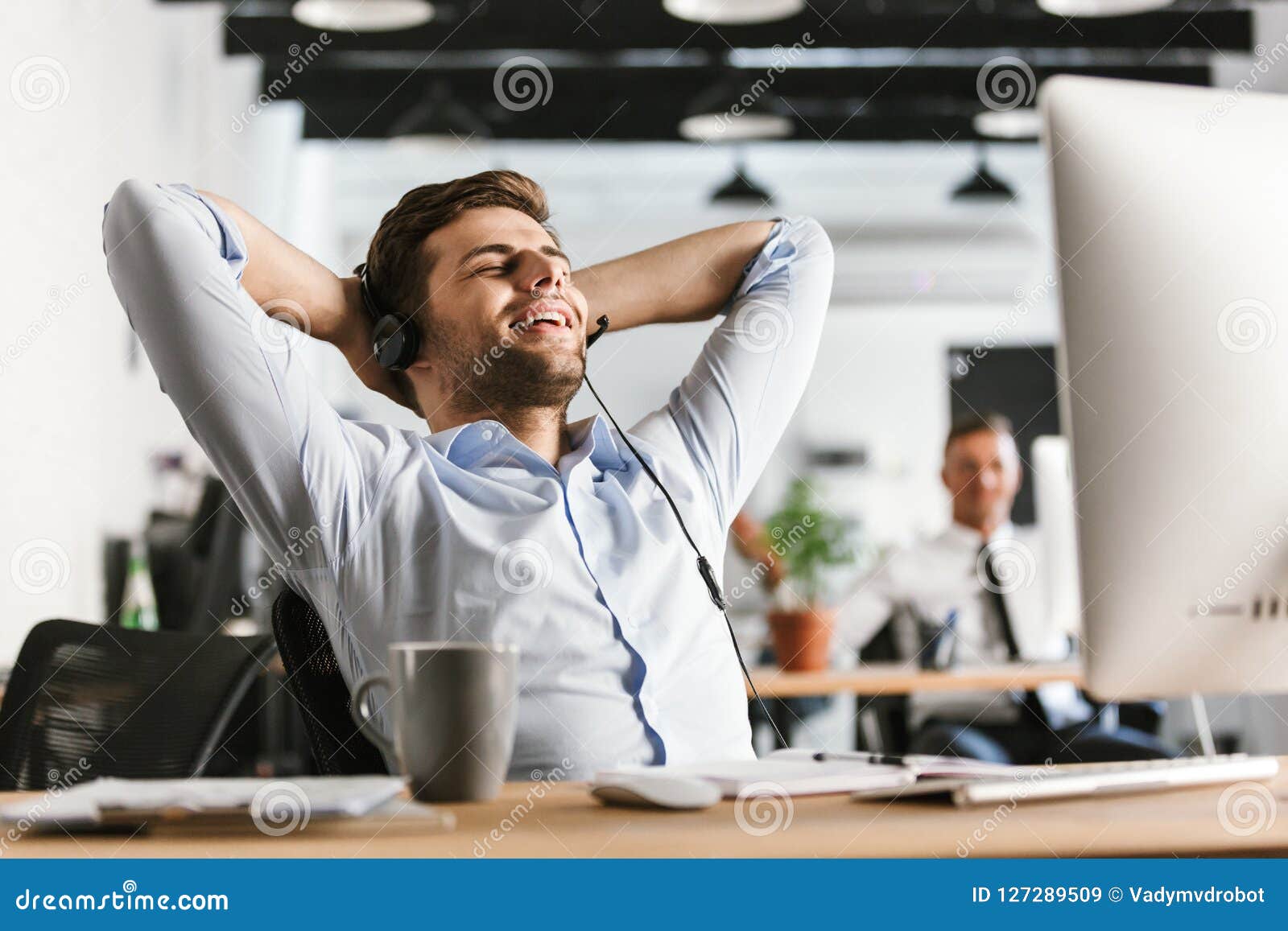 Joyful Office Manager Talking by Headset with Microphone Stock Image ...