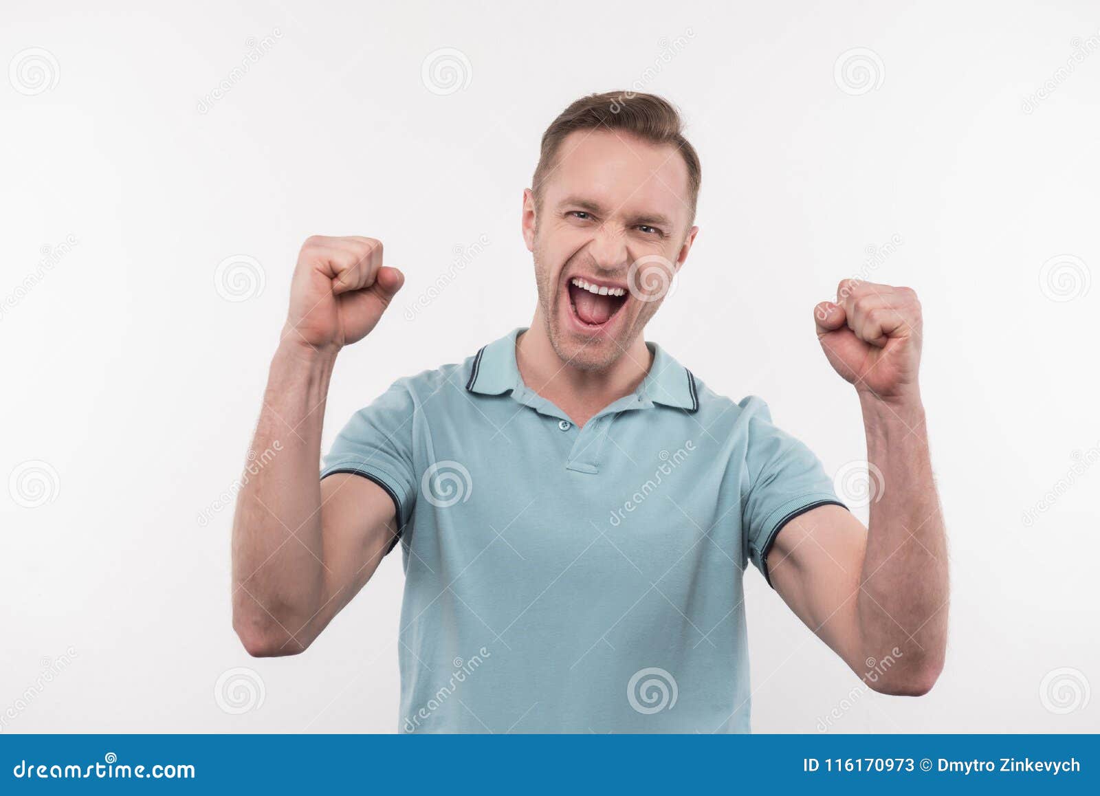 Joyful Positive Man Clenching Fists Stock Image - Image of delighted ... Joyful Positive Man Clenching Fists Stock Image - Image of delighted ...
