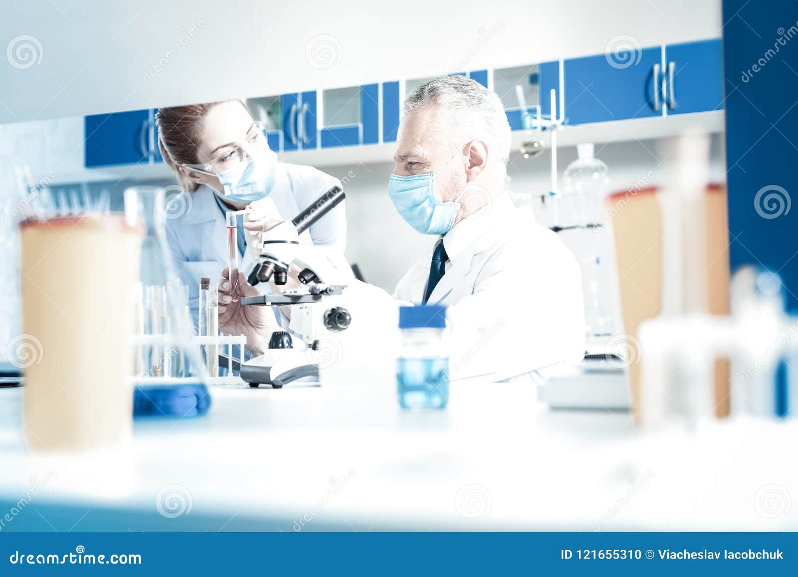 Joyful Positive Scientists Working in Team Stock Photo - Image of ... Joyful Positive Scientists Working in Team Stock Photo - Image of ...