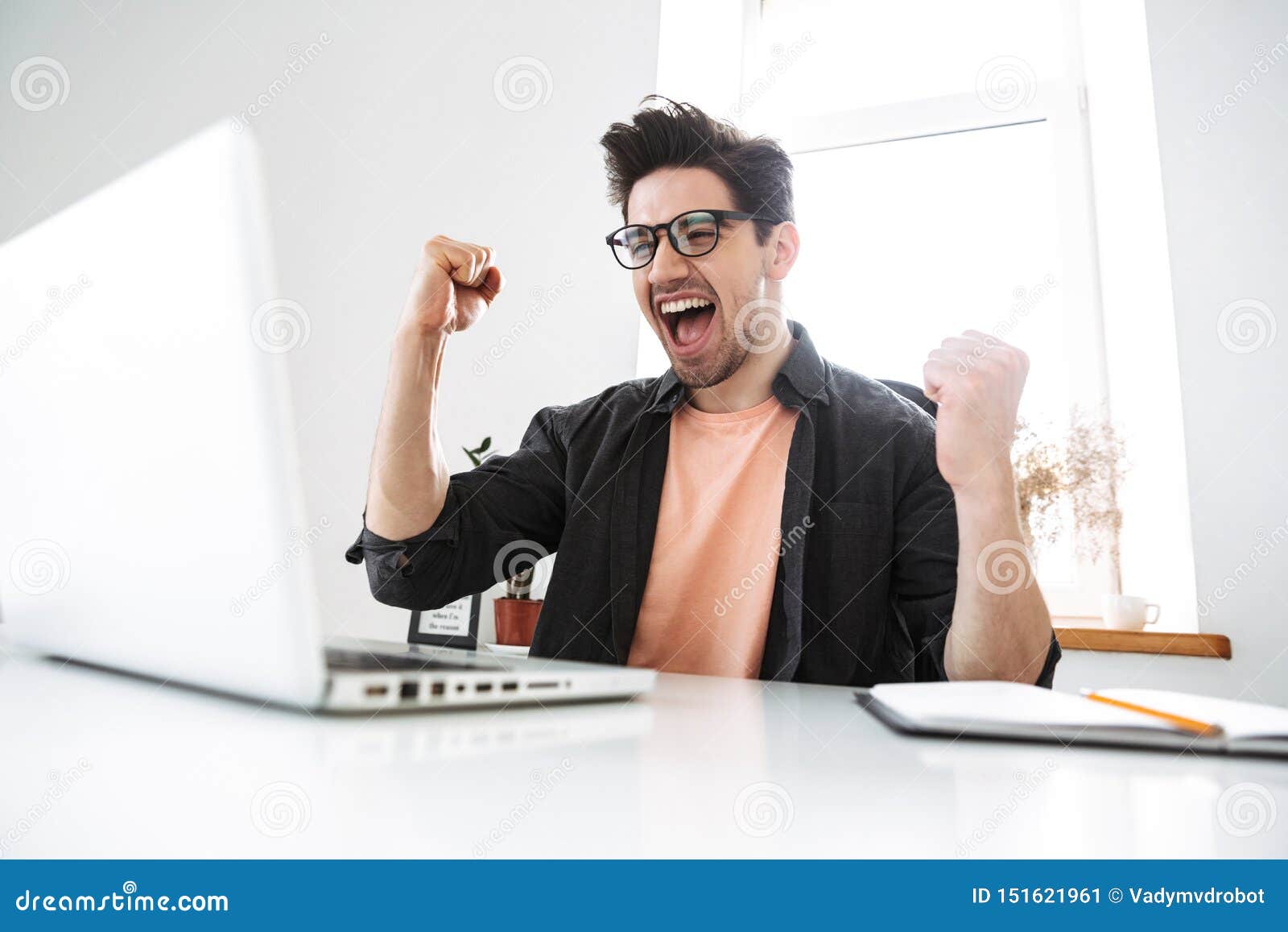 Joyful Screaming Handsome Man in Eyeglasses Using Laptop Computer Stock ...
