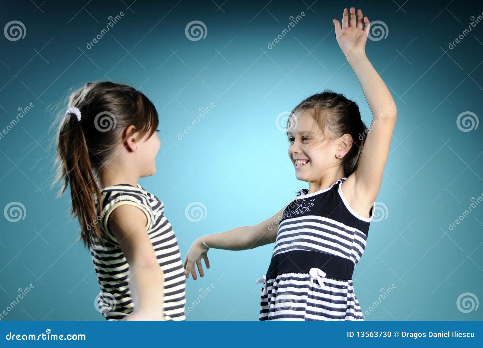 Joyful white twins dancing stock photo. Image of happiness - 13563730
