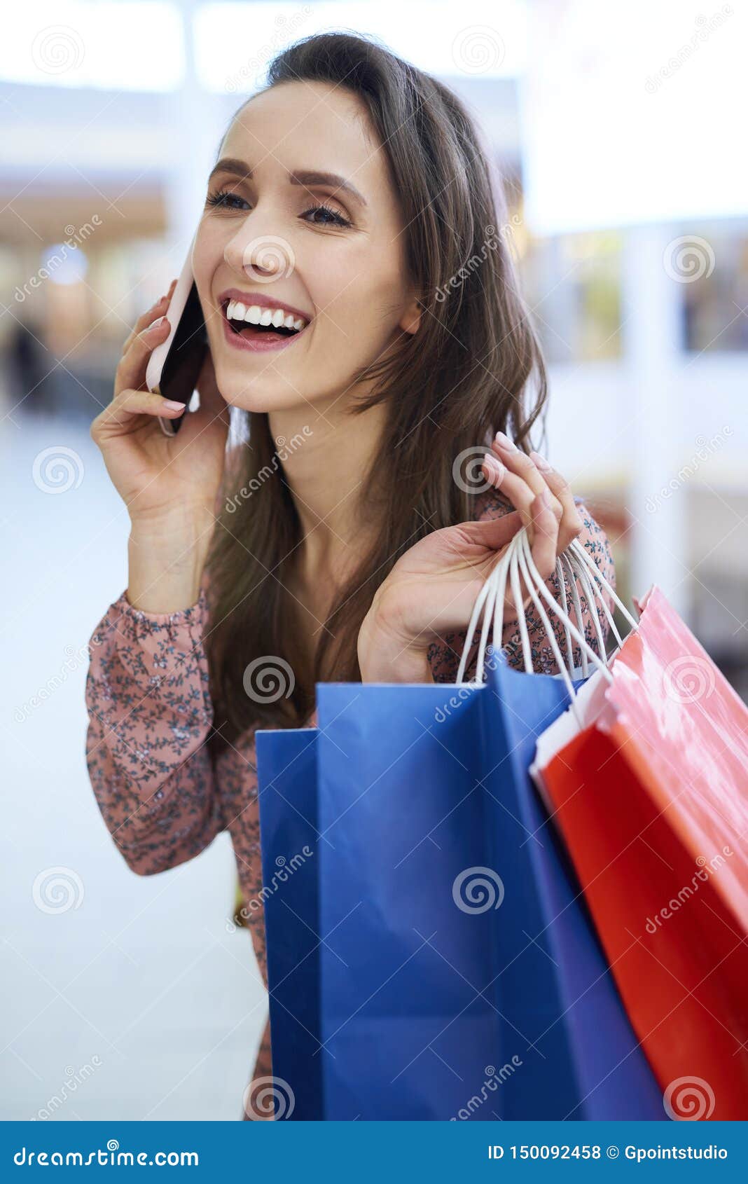 Joyful Woman with Full Shopping Bags Talking by Mobile Phone Stock ... Joyful Woman with Full Shopping Bags Talking by Mobile Phone Stock ...