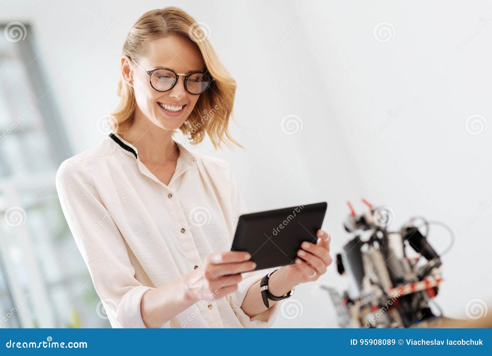 Joyful Woman Using Innovative Gadgets in the Office Stock Image - Image ...