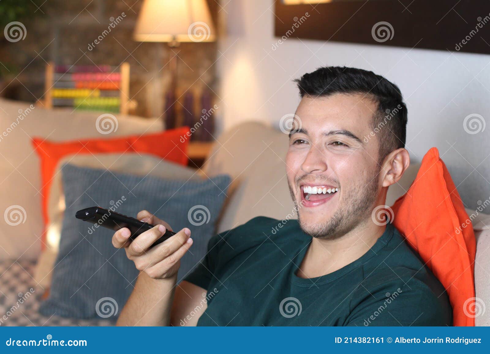 Joyful Young Guy Watching Television Stock Image - Image of apartment ...