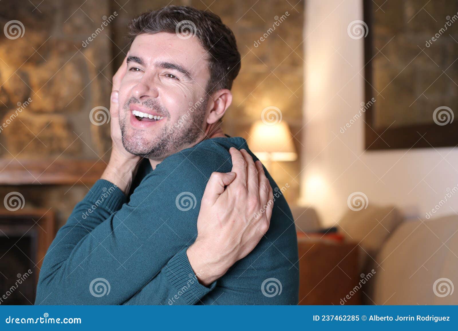 Joyful Young Man Hugging Himself Stock Image - Image of egocentric ...