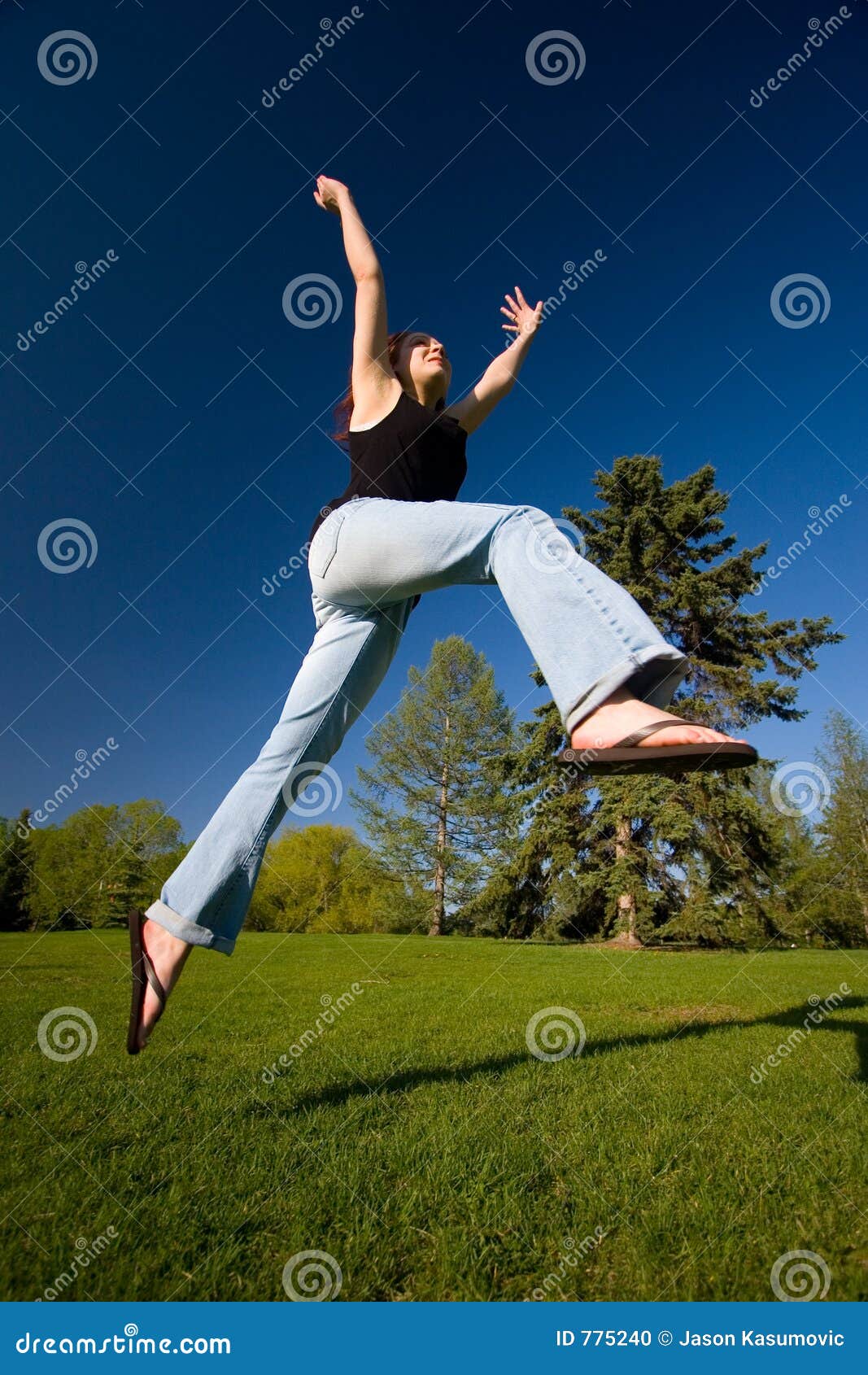 Joyous Jump stock photo. Image of success, sunshine, leap - 775240