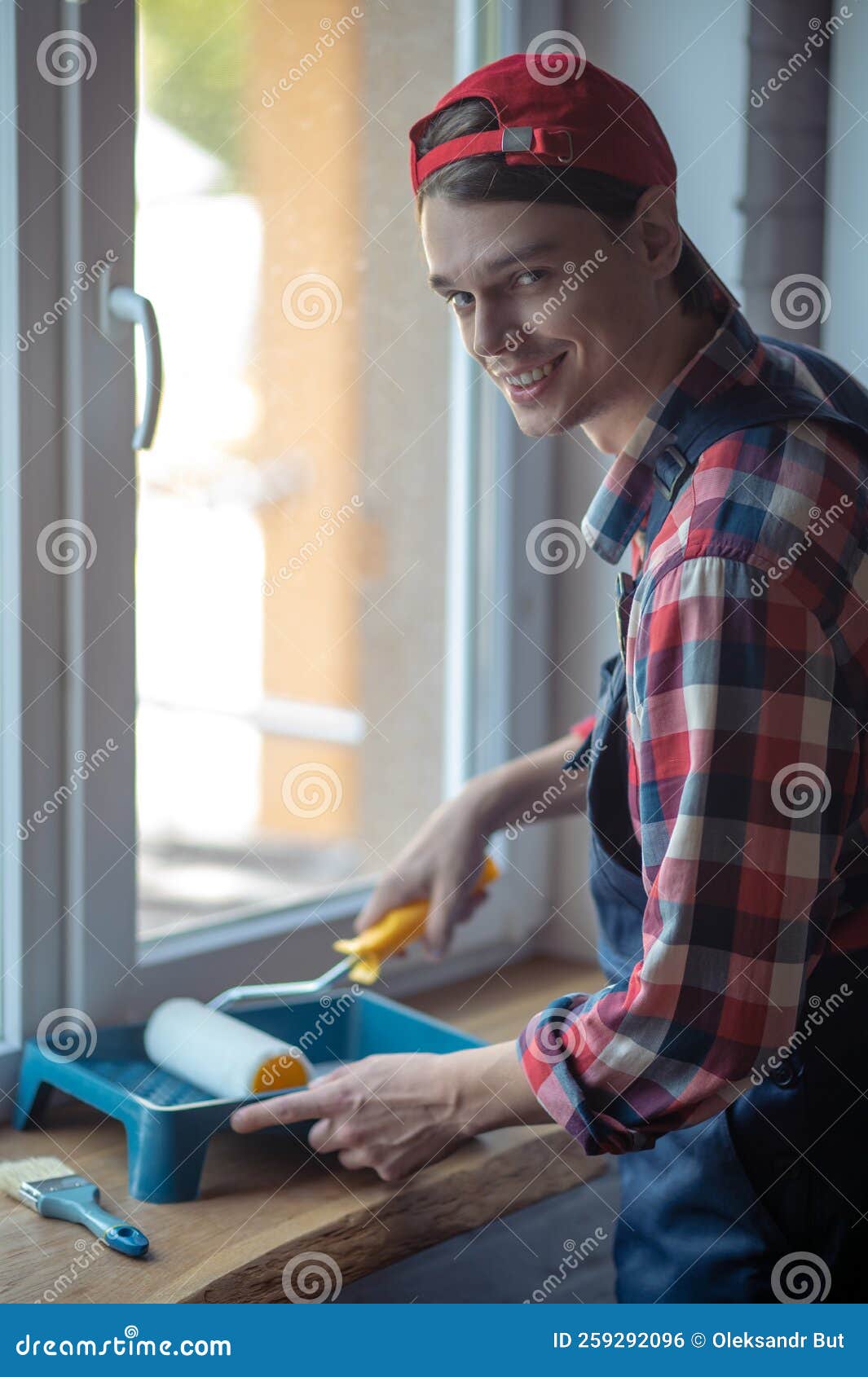 Joyous Young Painter Preparing for Painting Work Stock Photo - Image of ...