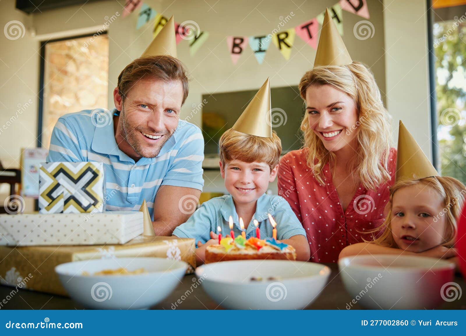 The Joys of Family Life. Portrait of a Happy Family Having a Birthday ... The Joys of Family Life. Portrait of a Happy Family Having a Birthday ...