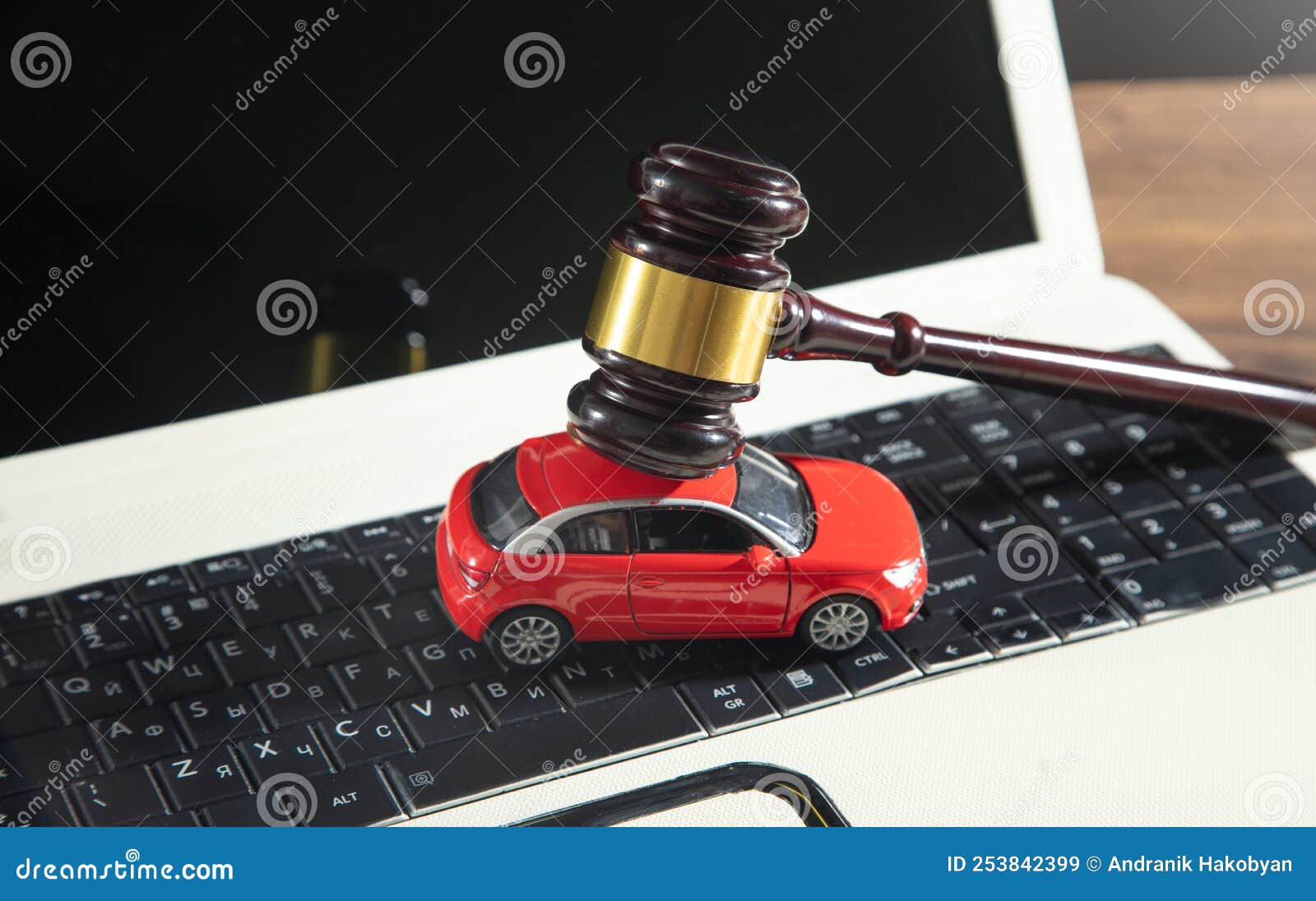 Judge Gavel with a Red Toy Car on the Computer Keyboard. Online Car ... Judge Gavel with a Red Toy Car on the Computer Keyboard. Online Car ...
