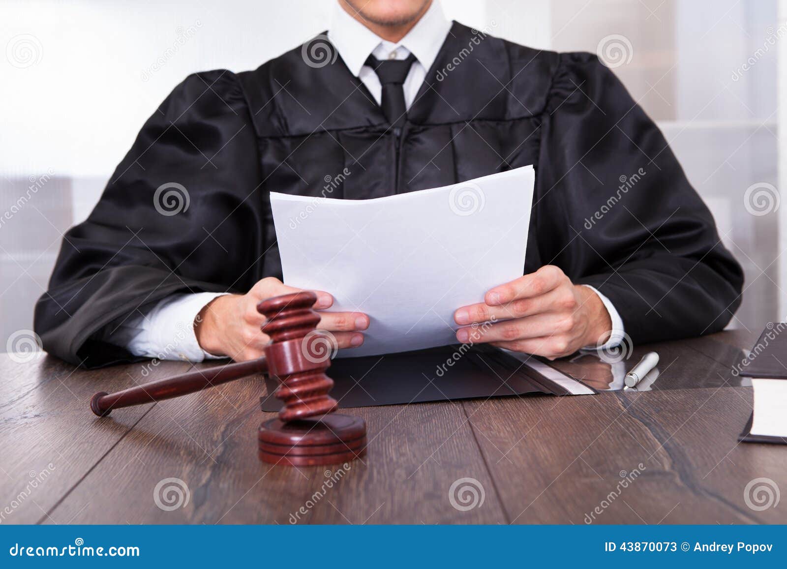 Judge holding documents stock image. Image of object - 43870073