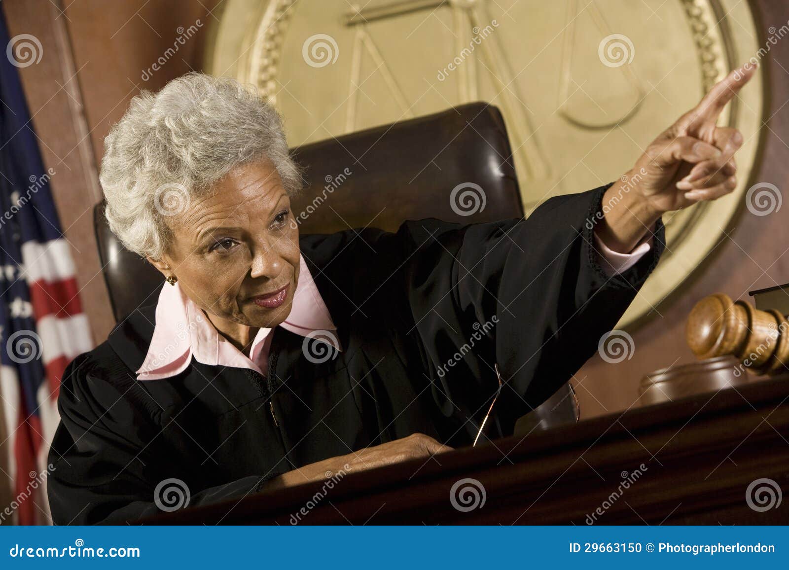 Judge Pointing in Courtroom Stock Photo - Image of government, flag ...