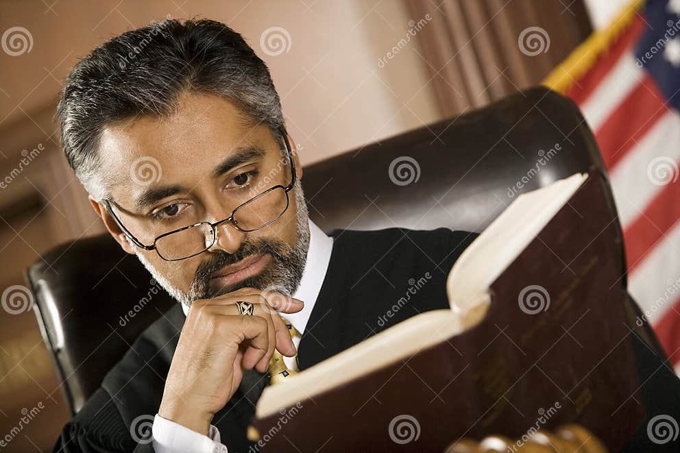 Judge Reading Law Book for Reference Stock Image - Image of judge ...