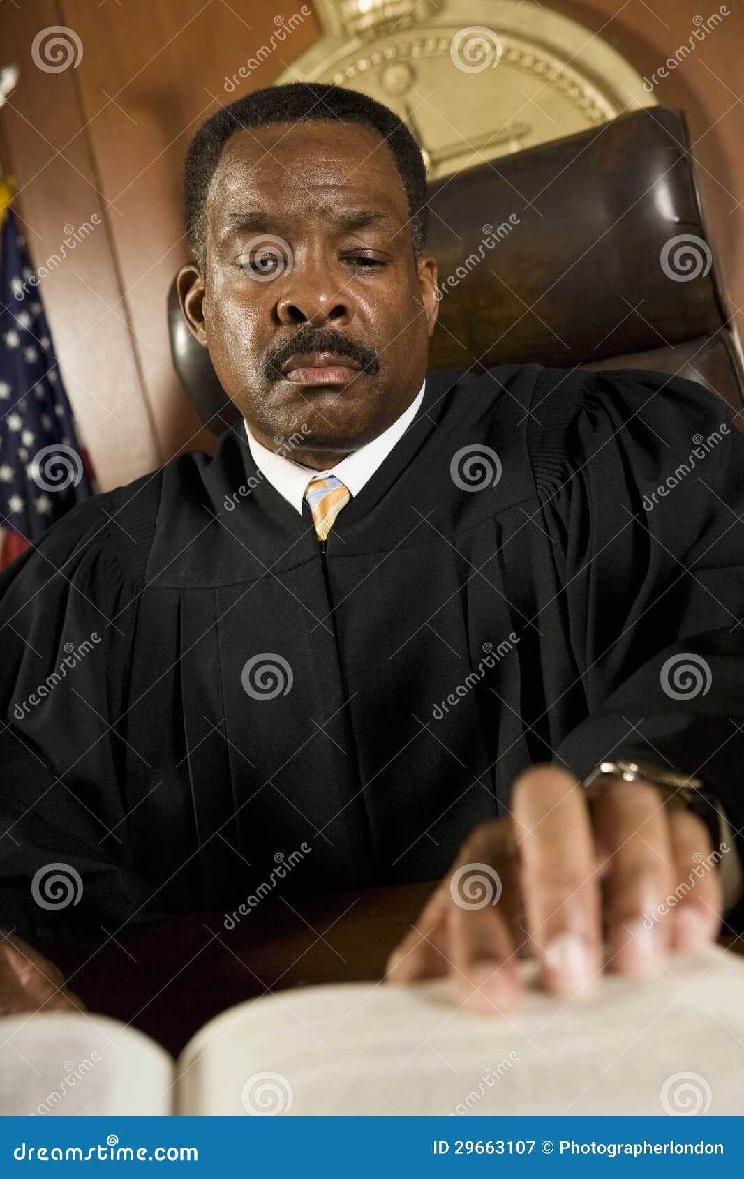 Judge Referring To Law Book Stock Image - Image of looking, book: 29663107