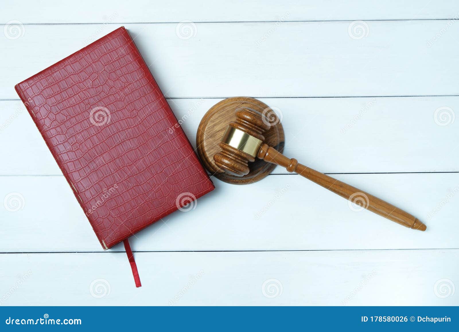 Judges Gavel and Red Diary on a White Wooden Background Stock Photo ...