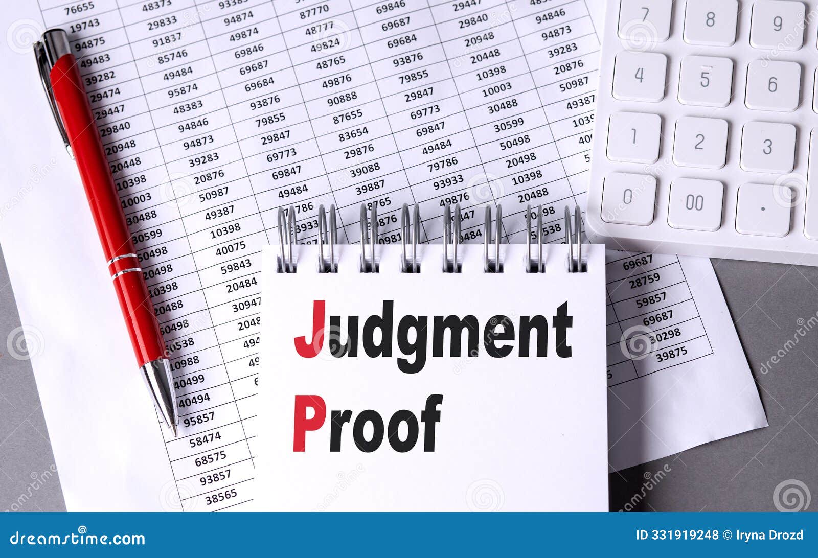JUDGMENT PROOF Text on Notebook with Chart , Pen and Calculator Stock ...