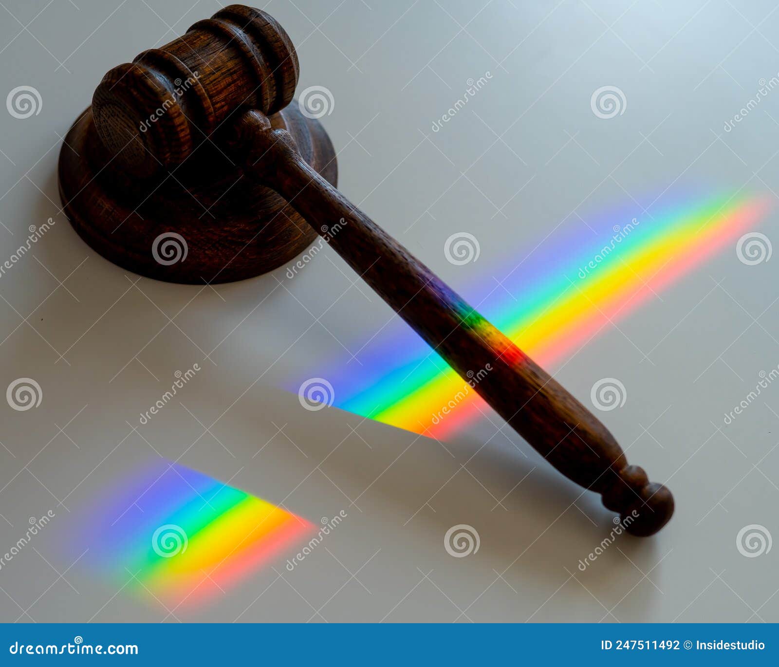 Judicial Gavel on a Table with a Rainbow Light Prism. Stock Photo ...
