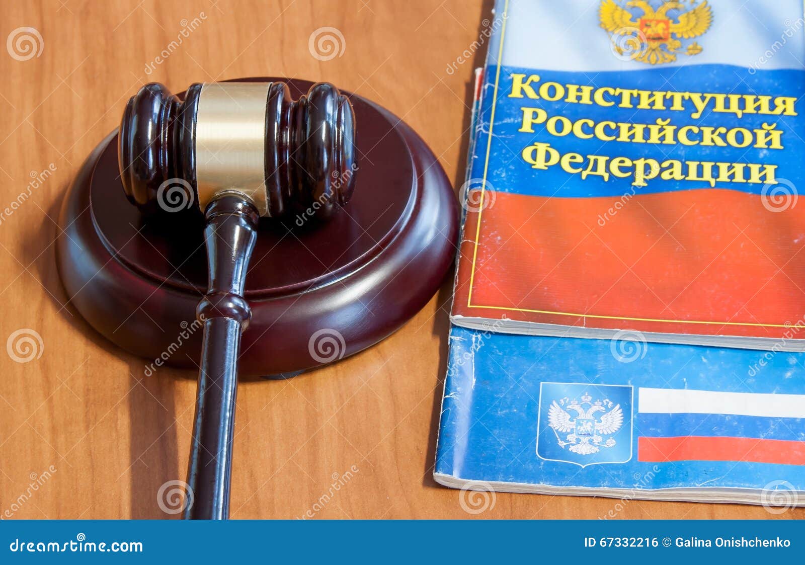 The Judicial Hammer and Codes of Laws Lay on a Table Stock Photo ...