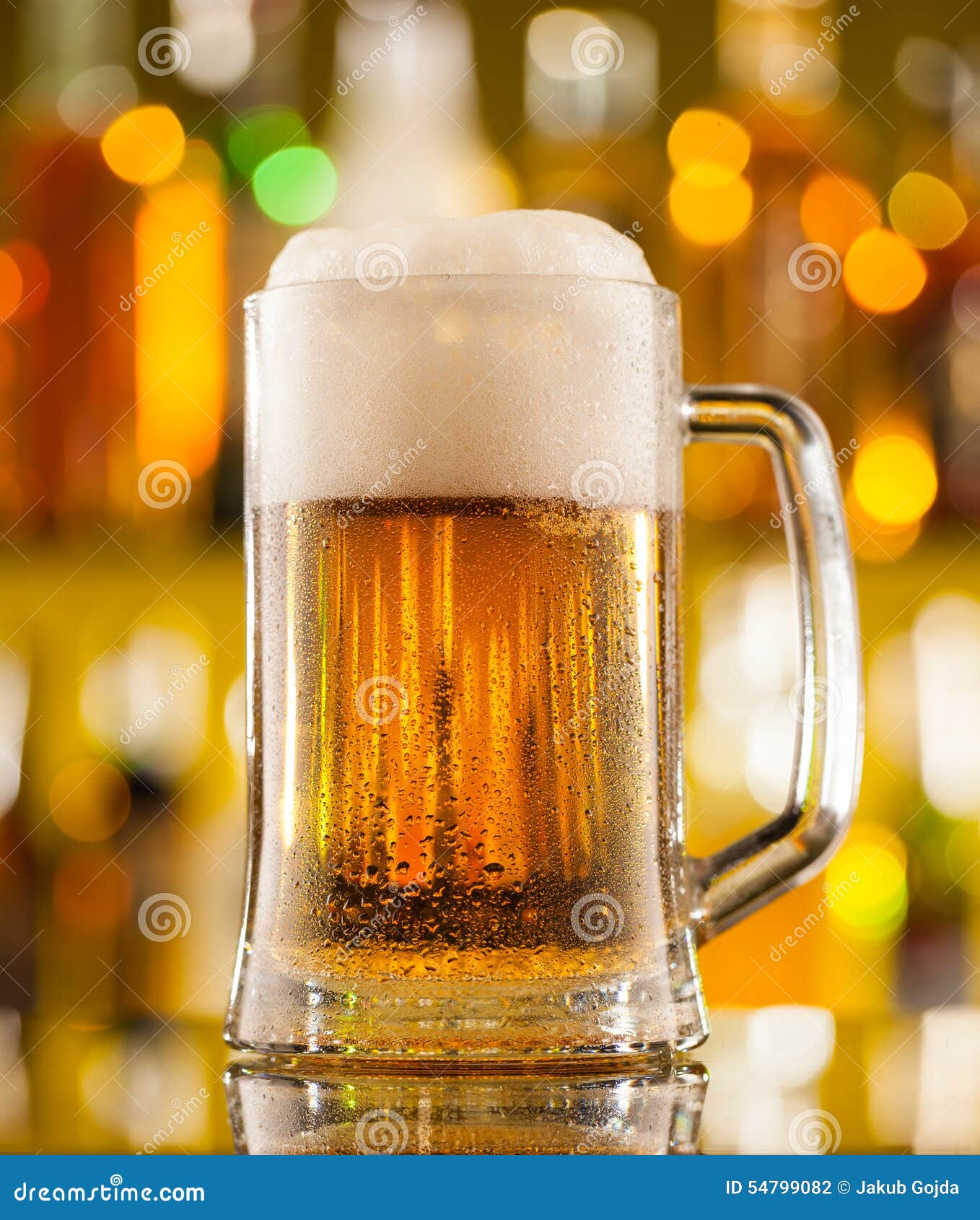 Jug of Beer Served on Bar Counter Stock Photo - Image of refreshment ...