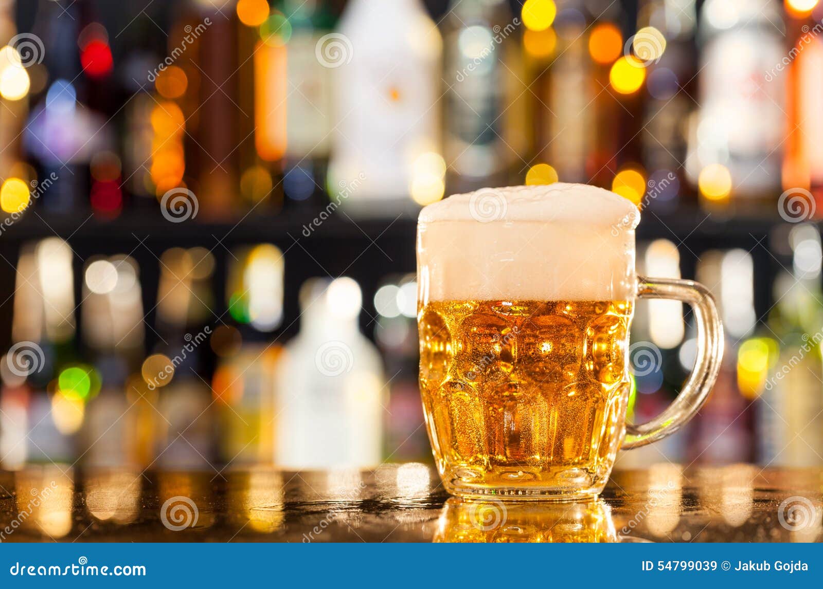 Jug of Beer Served on Bar Counter Stock Image - Image of foam ...