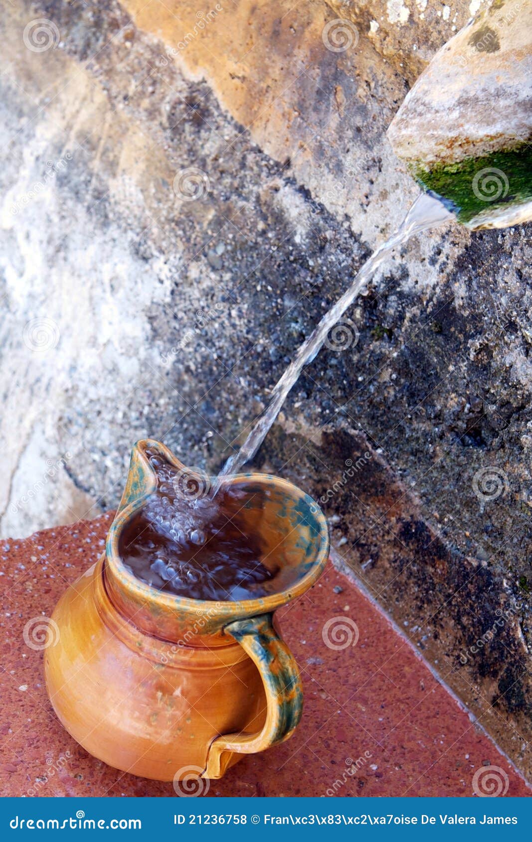 Jug Filling Up with Water from Spring Stock Photo - Image of flow ...