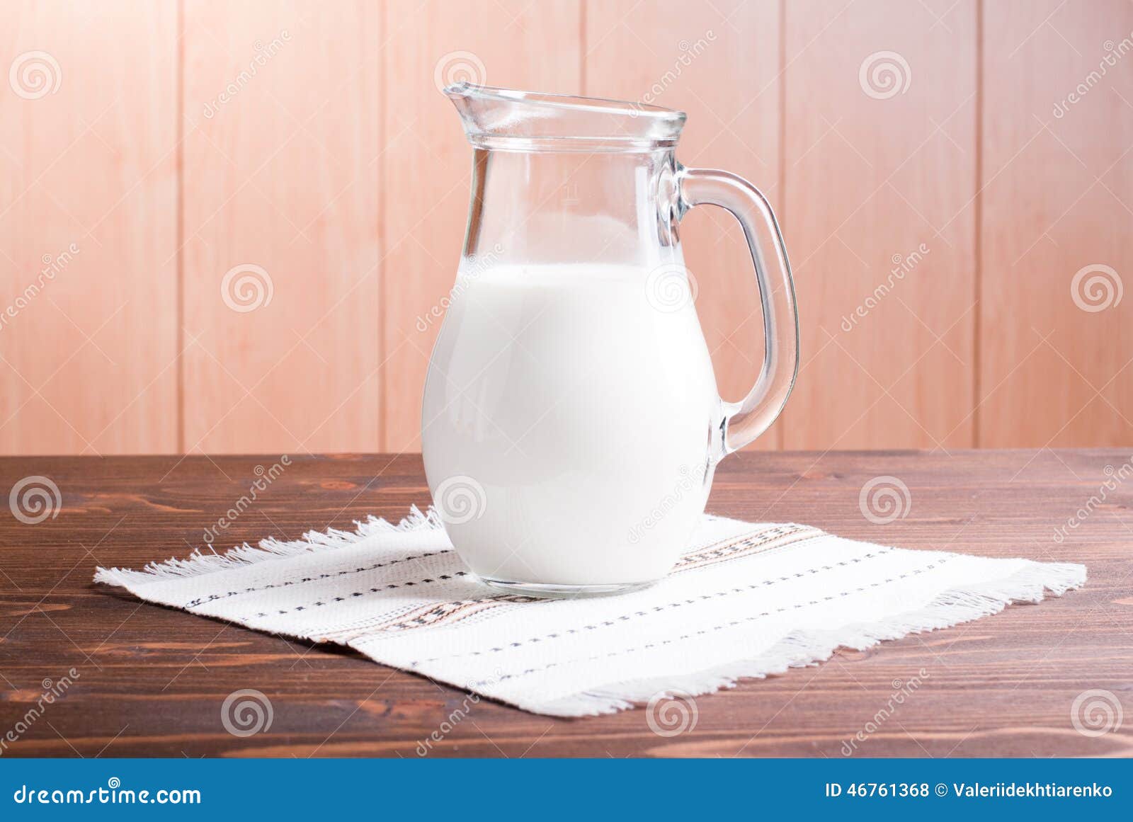 Jug with Milk on a Light Wooden Table Side View Stock Photo - Image of ...