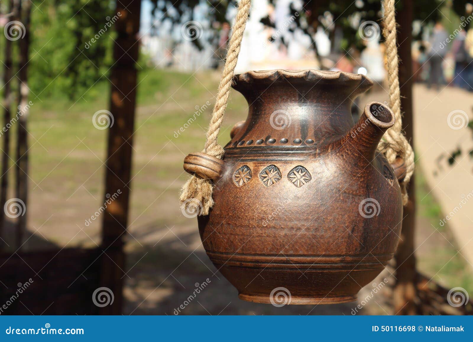 Jug on a rope stock photo. Image of brown, round, rope - 50116698