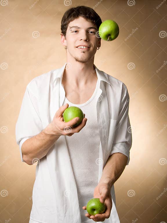 Juggling with apples stock photo. Image of adult, casual - 1647100