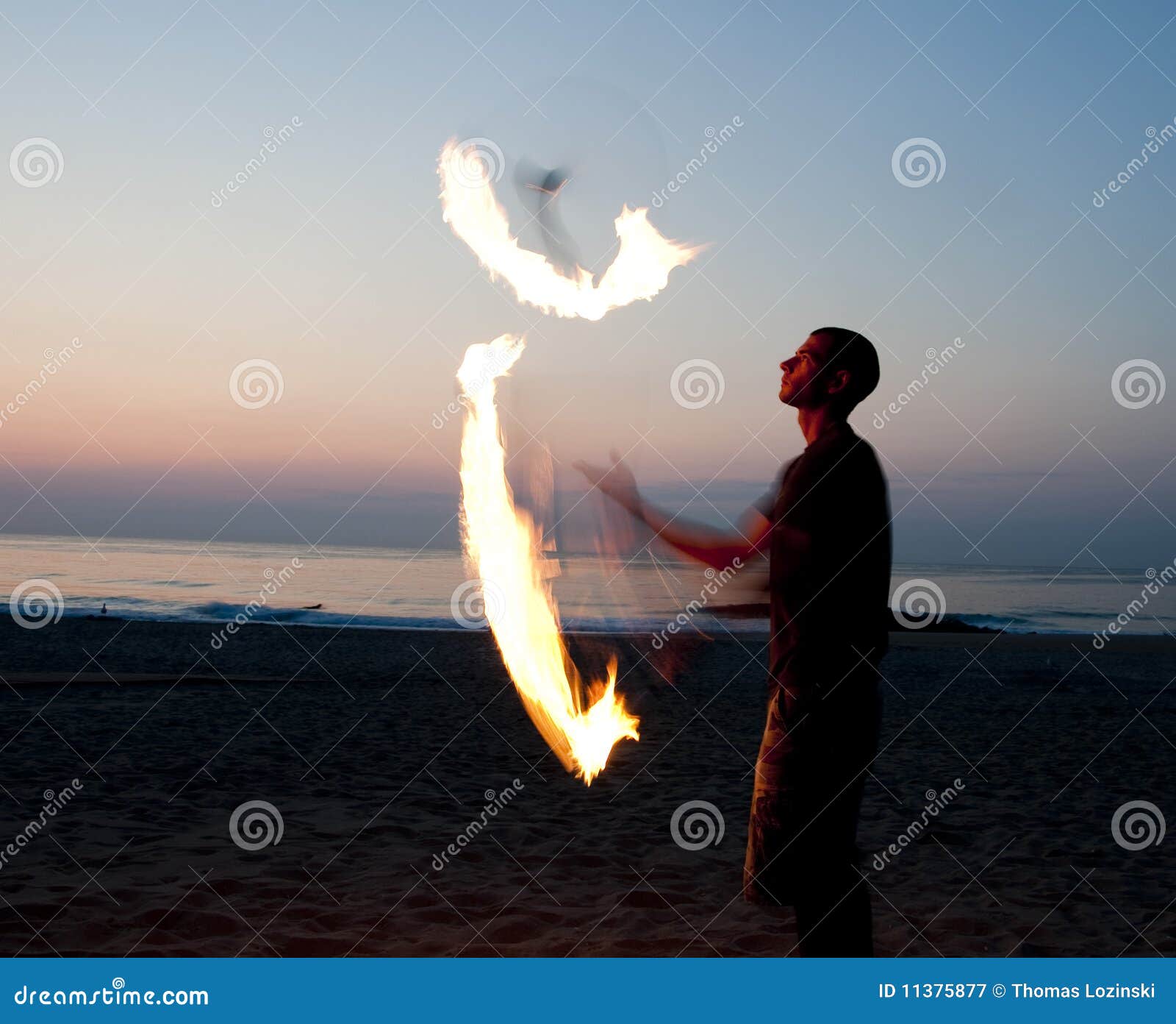 Jugglng torches stock image. Image of beach, burn, dance - 11375877