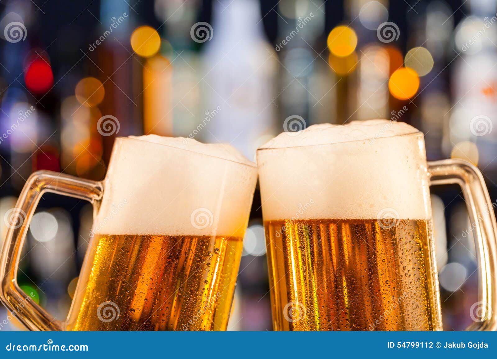 Jugs of Beer Served on Bar Counter Stock Photo - Image of filled, foam ...