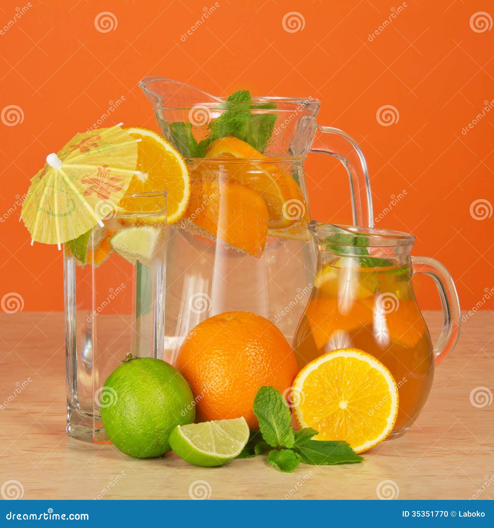Jugs with drinks and glass stock photo. Image of lime - 35351770