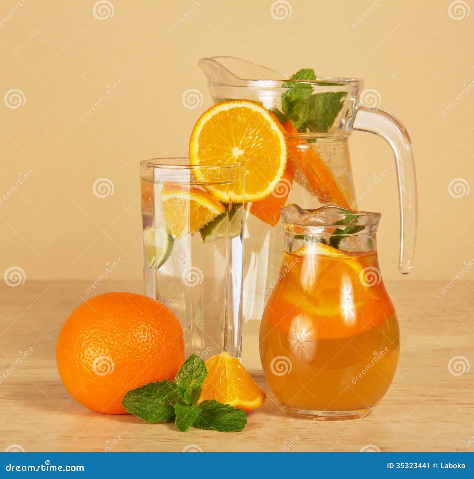 Jugs with drinks and glass stock image. Image of beverage - 35323441