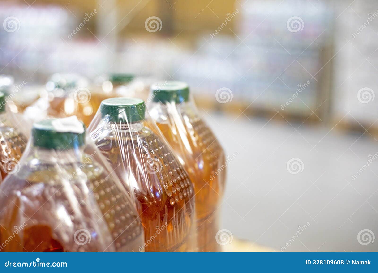 Juice and Other Drinks Packed in Plastic Containers with Green Stock ...