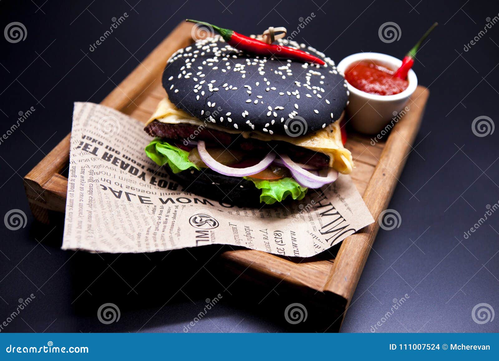 A Juicy Black Burger. Burger with Marble Beef, Fork with Knife and ...