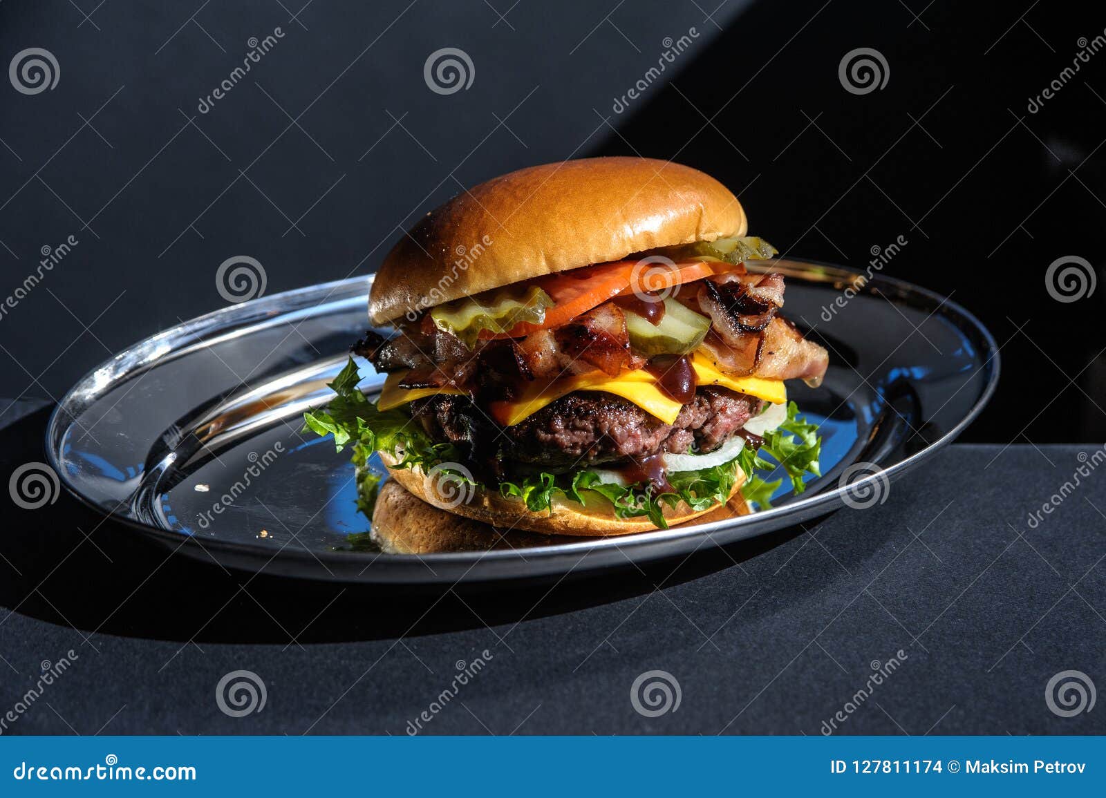 Juicy Burger on a Metal Plate Stock Photo - Image of lunch, plate ...