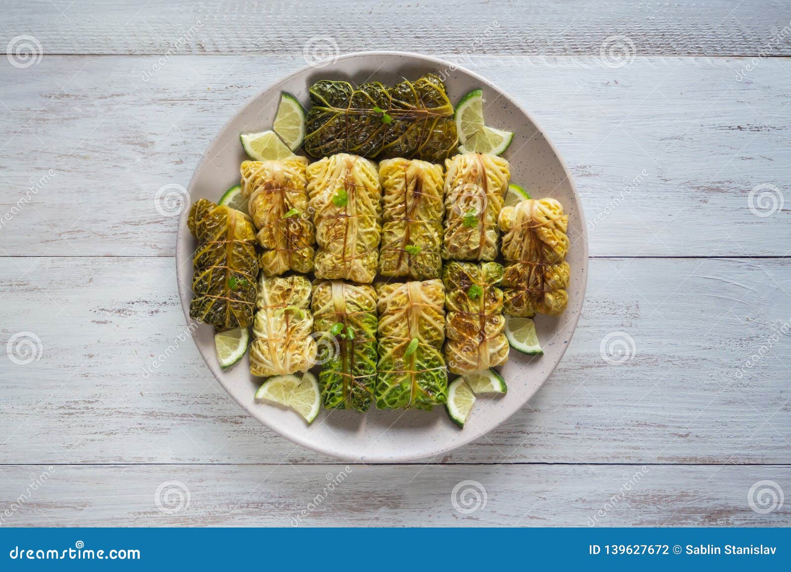 Juicy Cabbage Rolls in a Plate on a Wooden Table. Stock Photo - Image ...