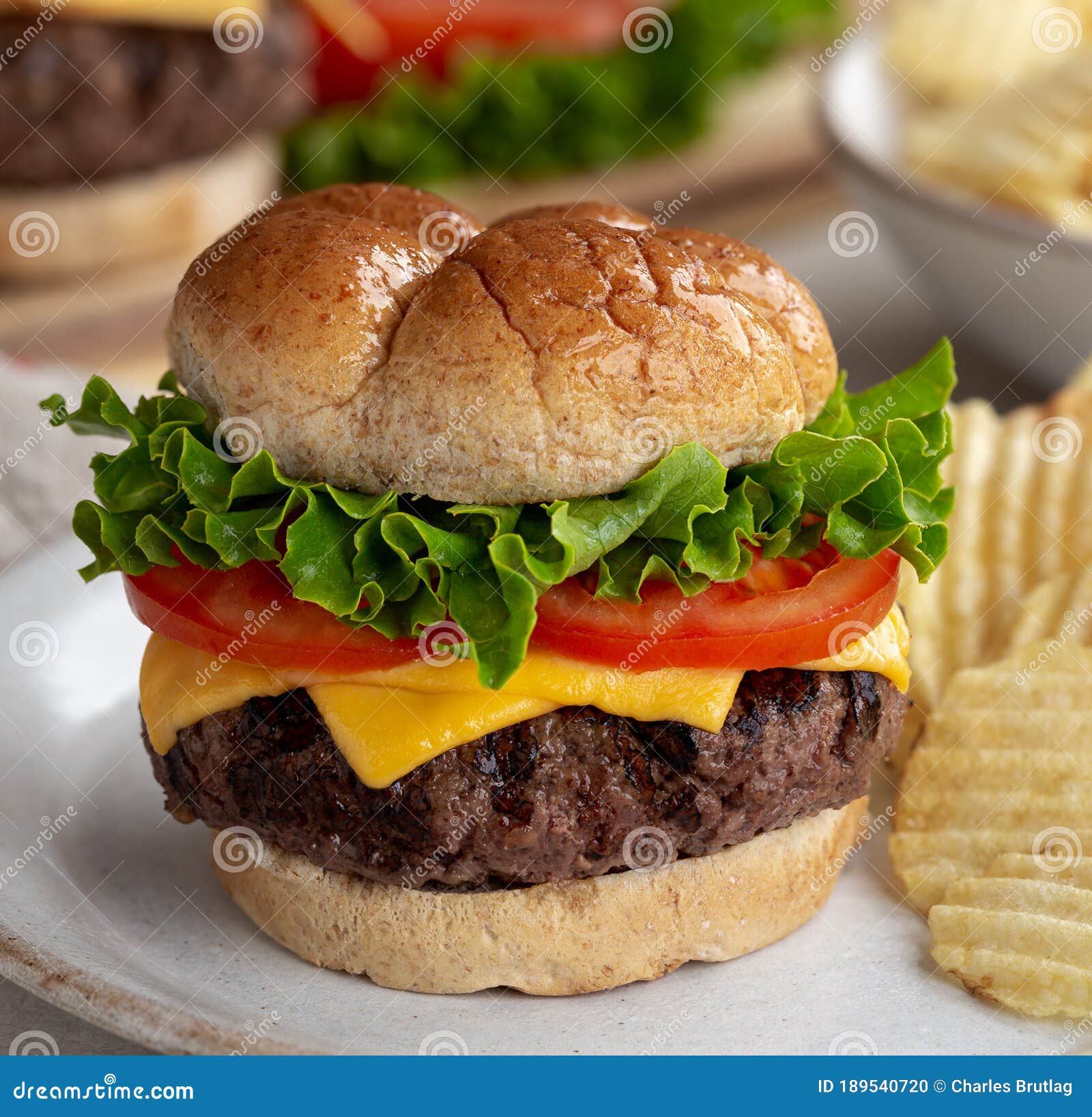 Juicy Grilled Cheeseburger and Chips Stock Photo - Image of meal, thick ...