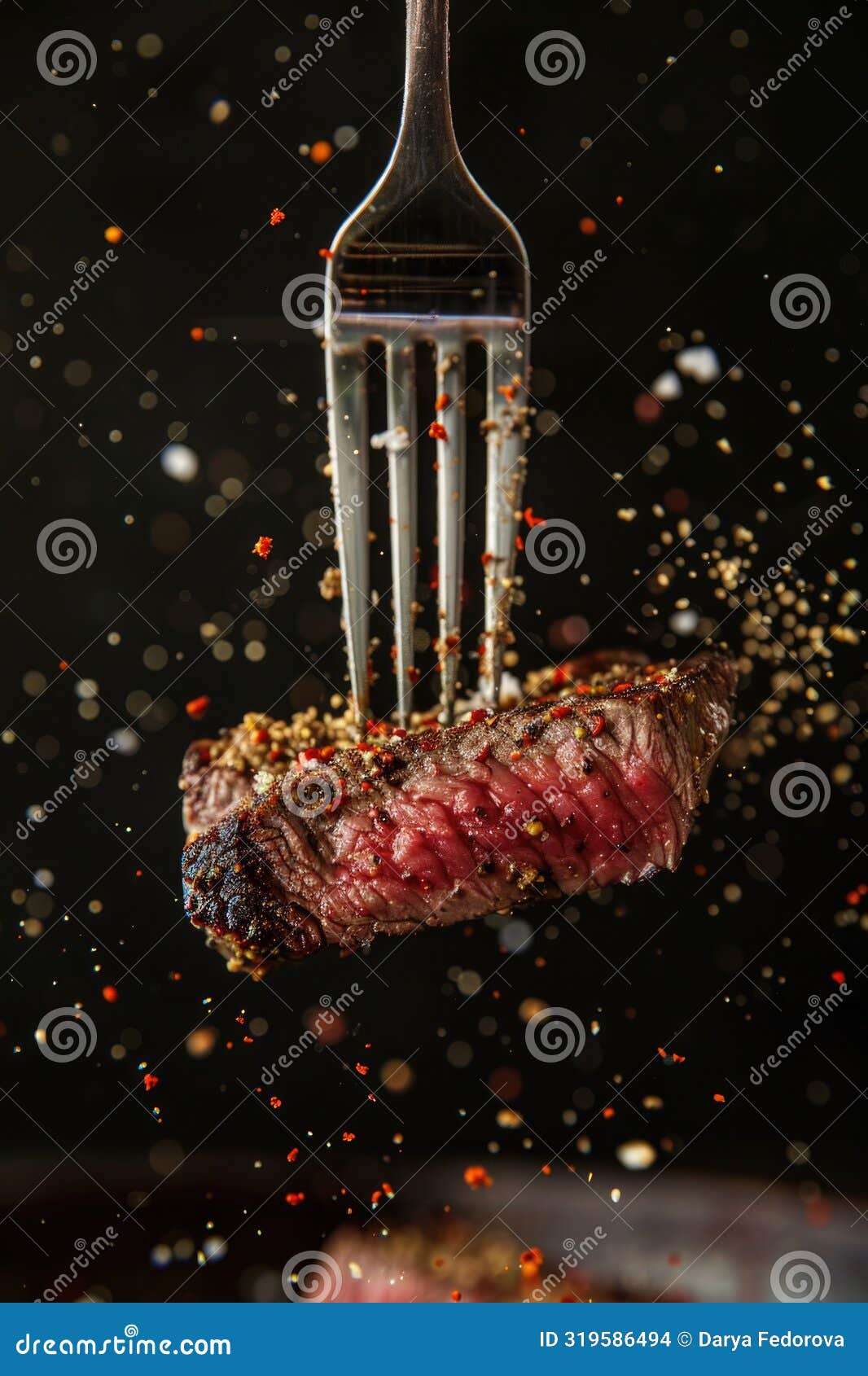 Juicy Grilled Steak on Fork with Herbs and Spices Falling Dramatically ...