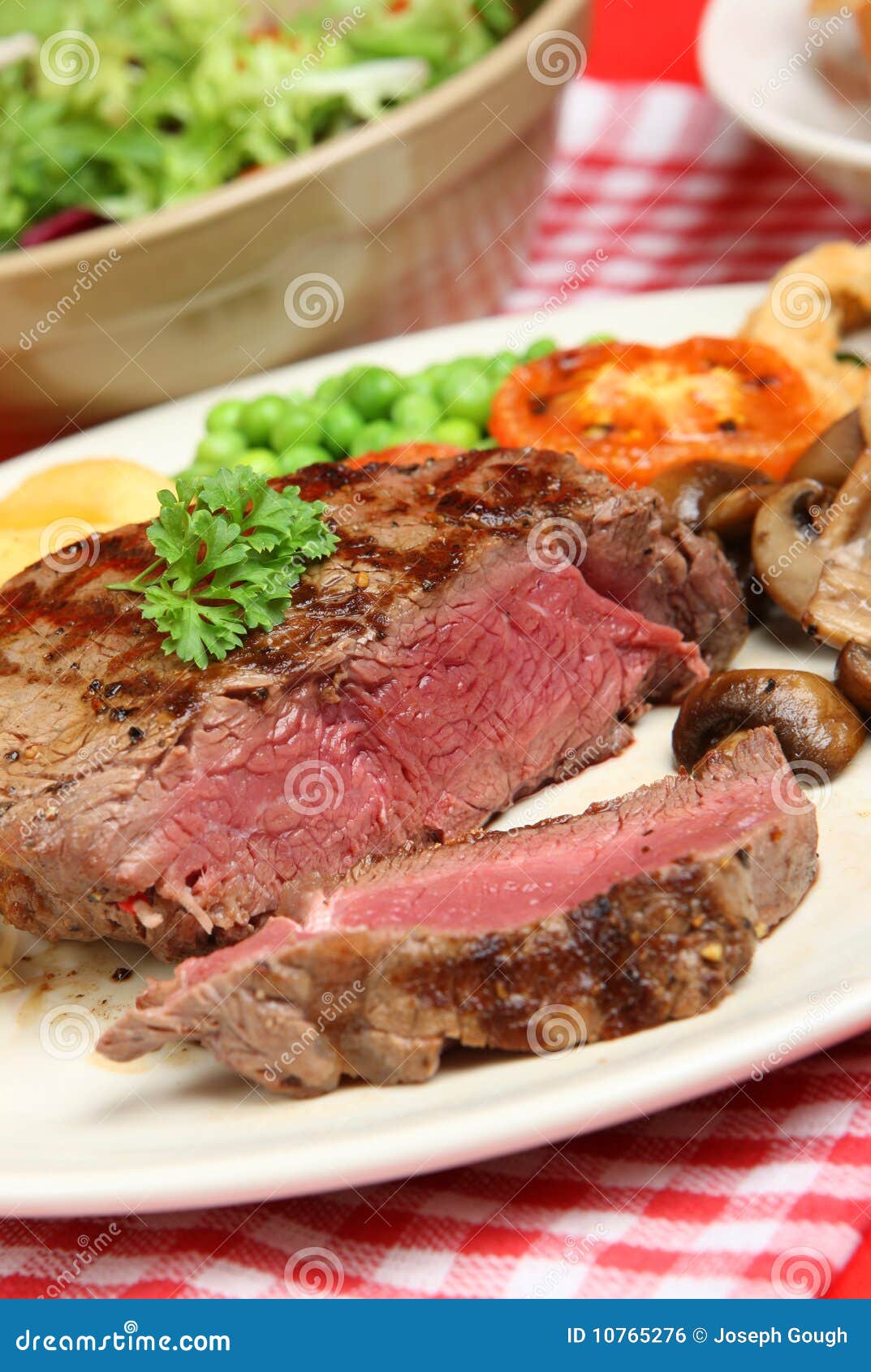 Juicy Rare Fillet Steak Dinner Stock Photo - Image of seasoning, fries ...